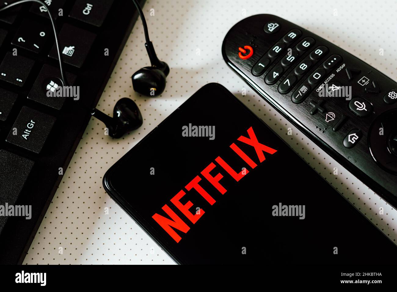 In this photo illustration, the logo of the Netflix, seen displayed on ...