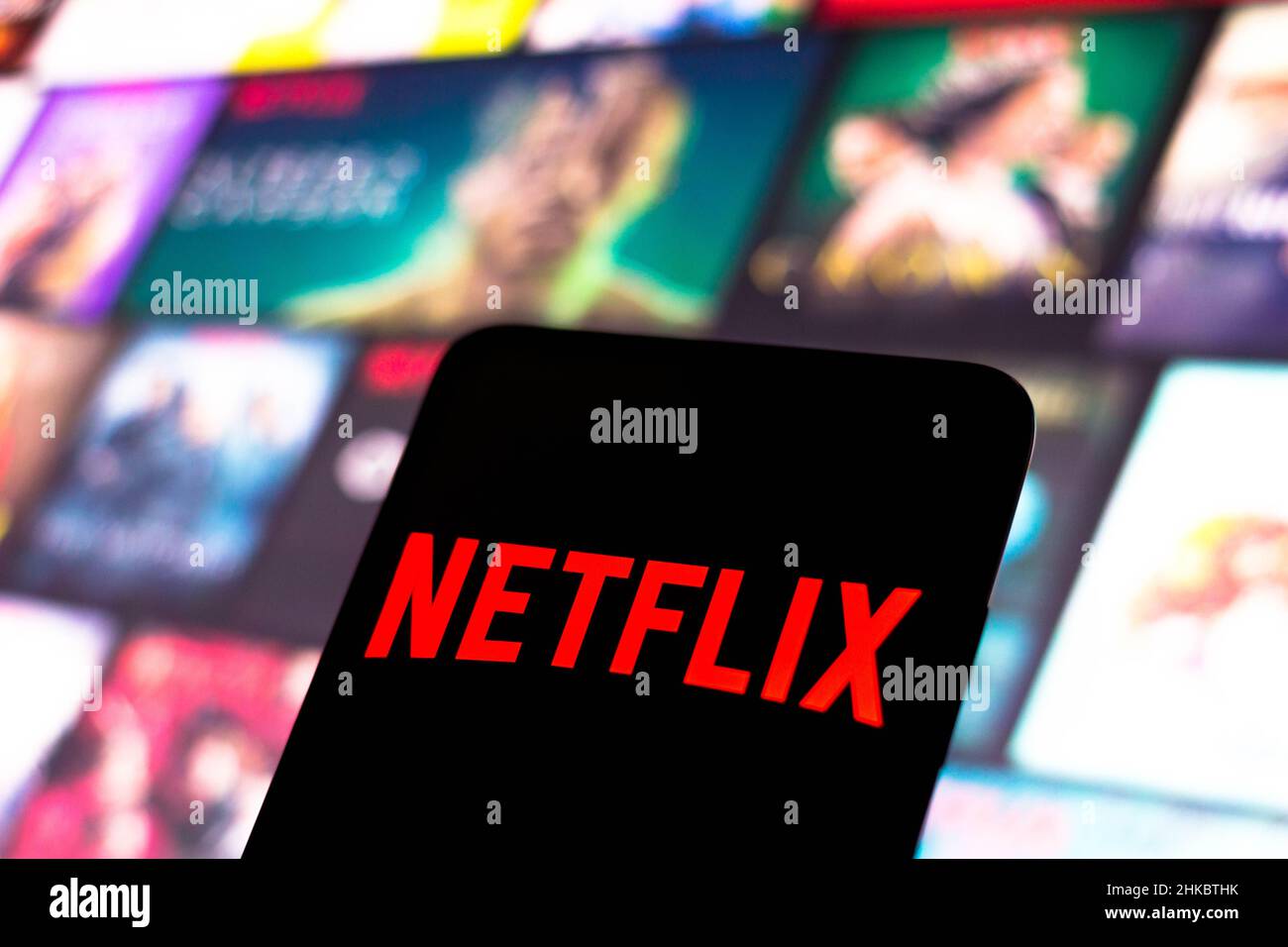 In this photo illustration, the Netflix logo seen displayed on a ...