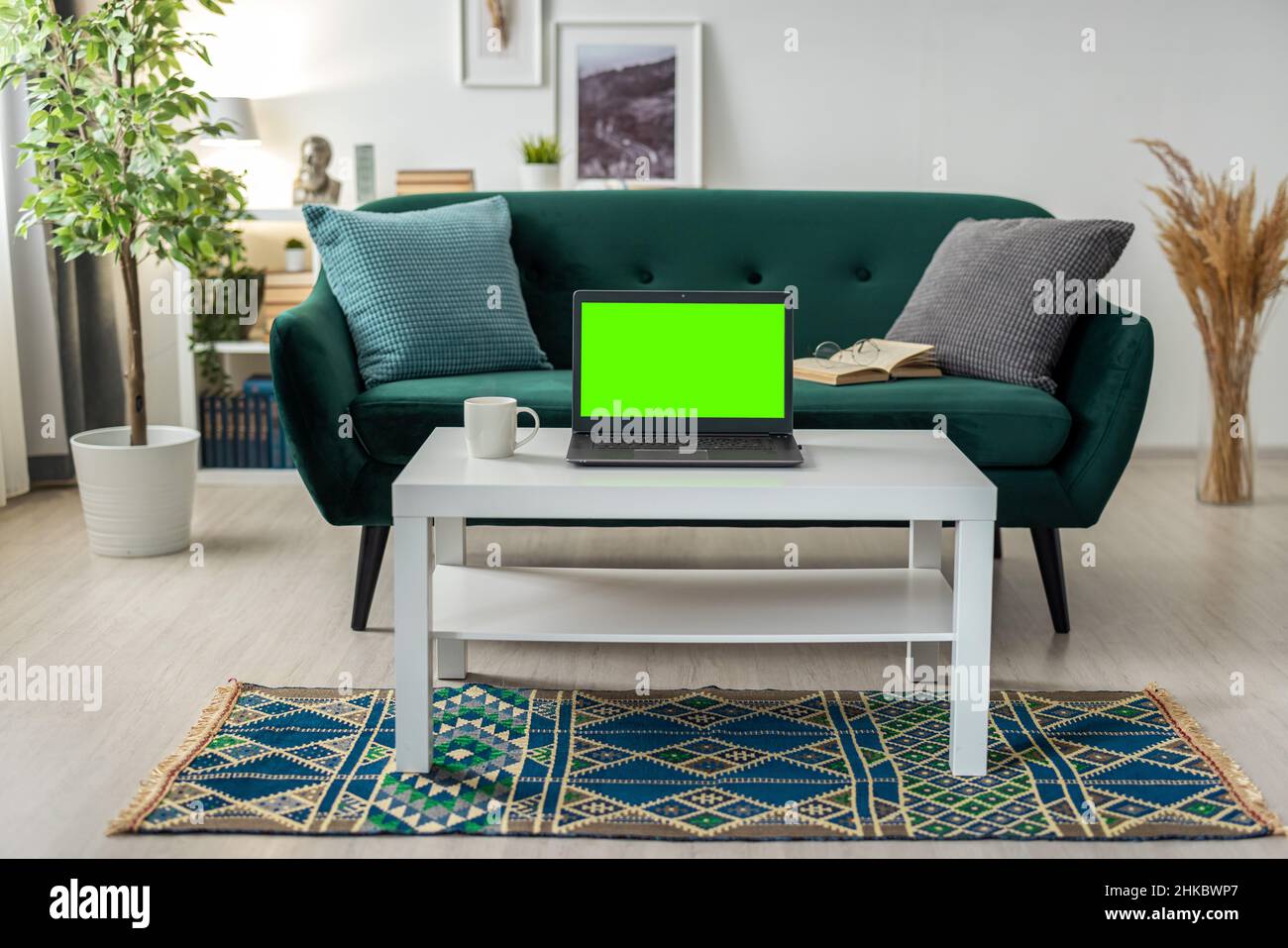 Green screen laptop at living room Stock Photo - Alamy