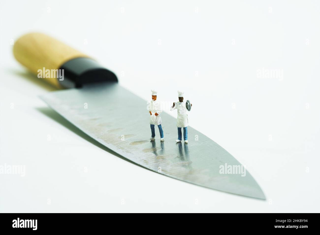 chefs standing on a kitchen knife o Stock Photo - Alamy