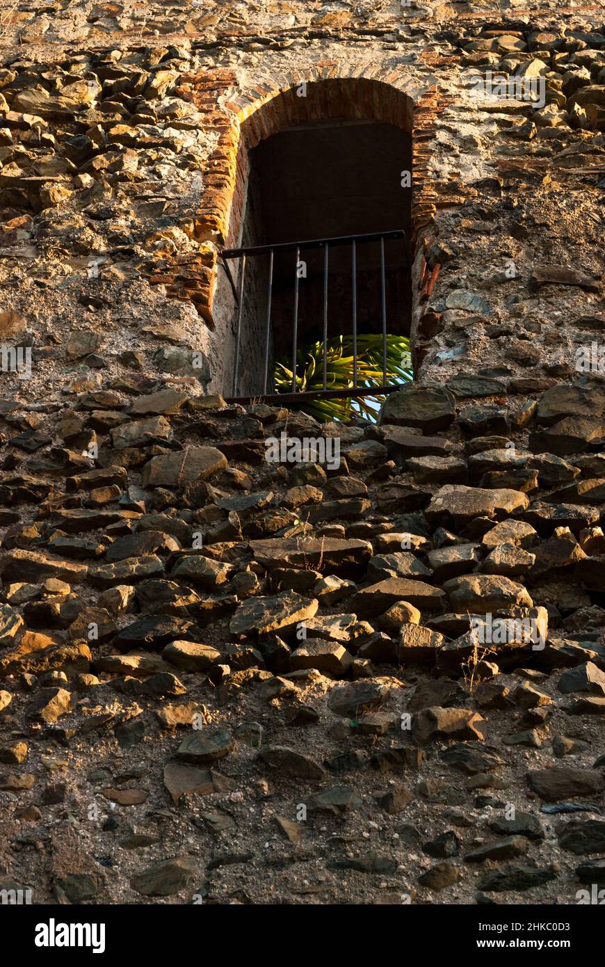Balcony in Arab wall of slate stone and red brick in Granadilla in ...