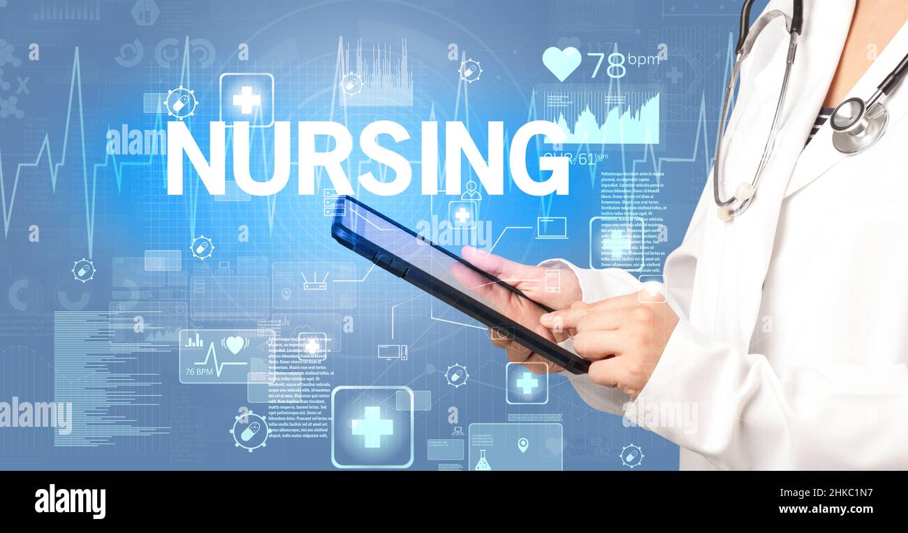 young doctor writing down notes Stock Photo - Alamy