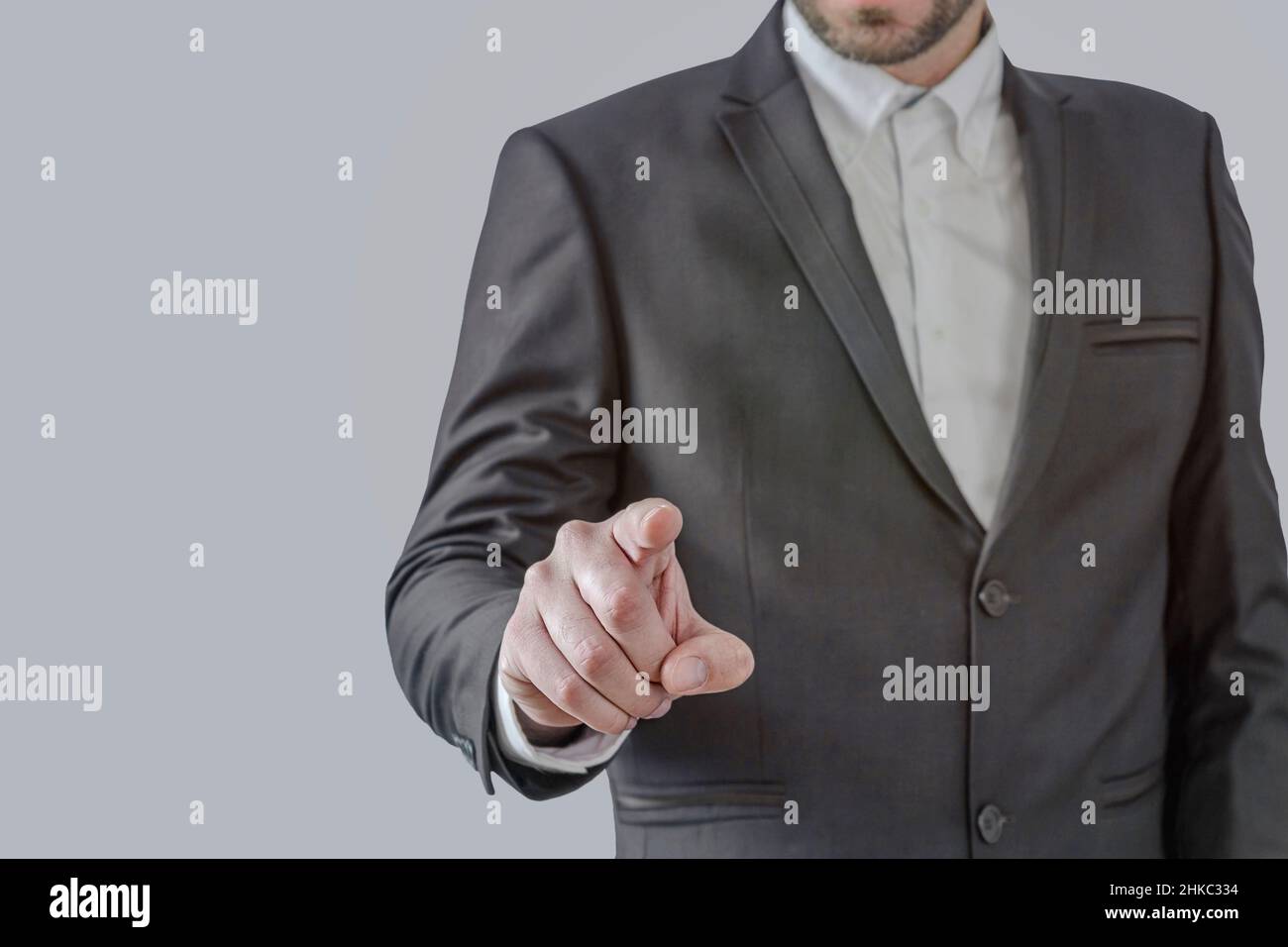 Business man points his finger at you Stock Photo - Alamy