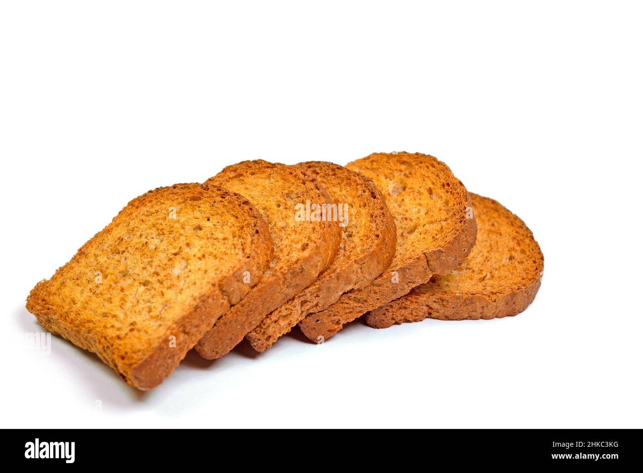 Rusk slices isolated against a white background Stock Photo - Alamy