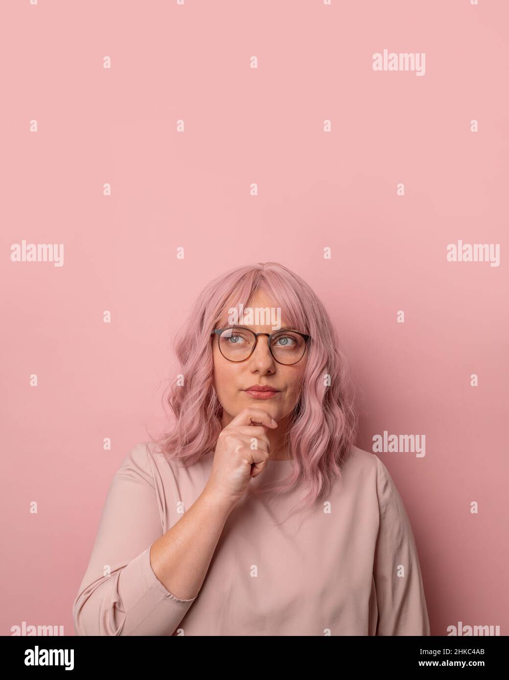 Portrait of attractive focused concentrated woman, thinking, dreaming ...