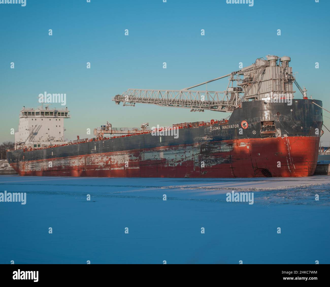 Cargo ship in frozen river Stock Photo - Alamy