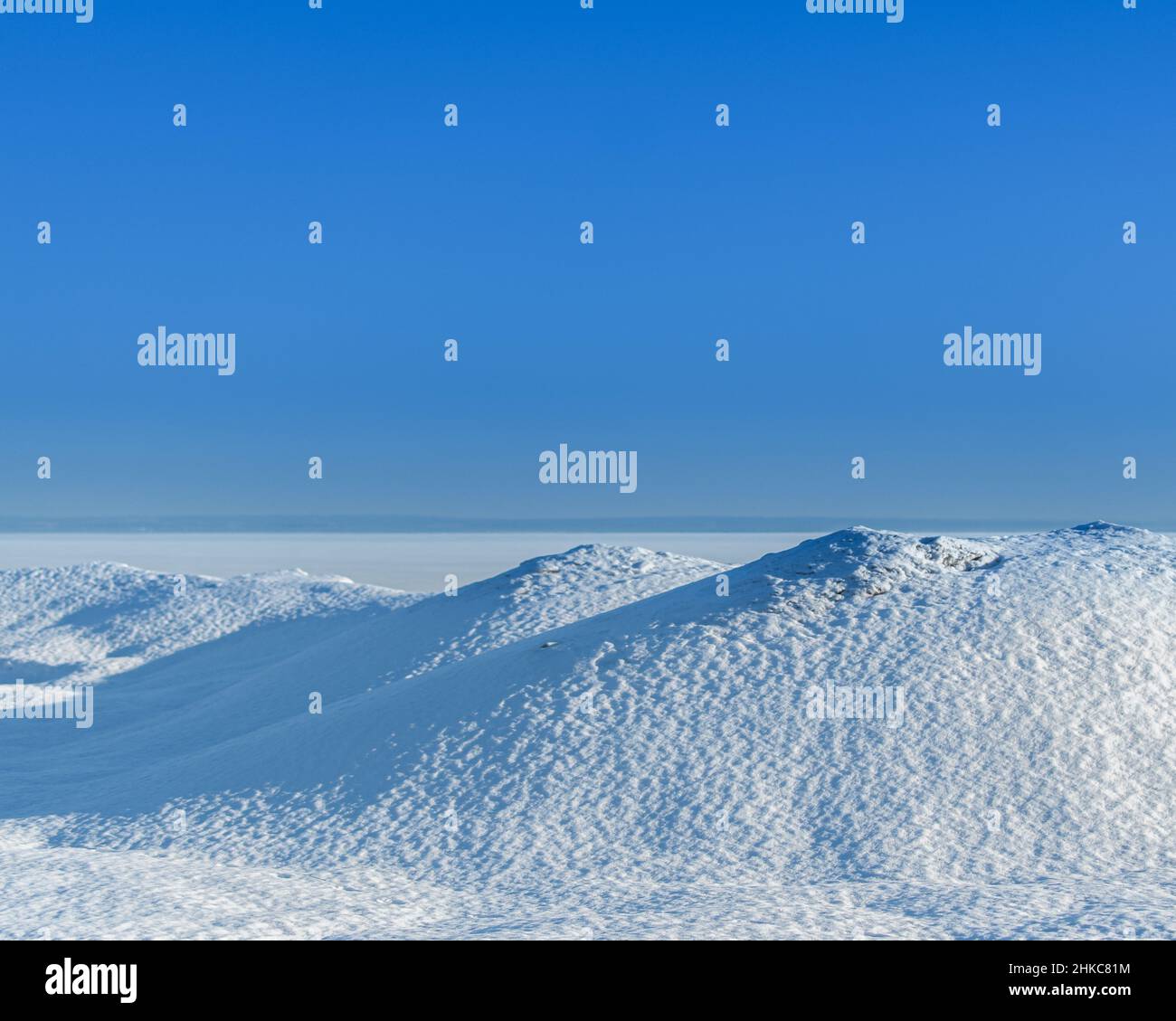 frozen desert with snow mountains with clear day Stock Photo - Alamy