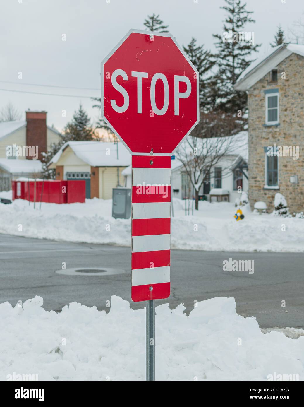 stop sign at street intersection in neighborhood Stock Photo - Alamy