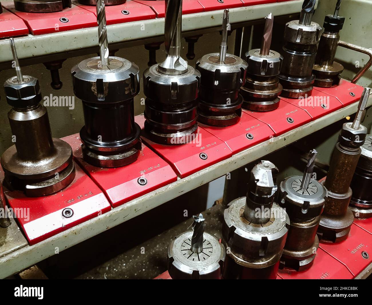 machining metal and plastic blanks on a multi-profile CNC machine Stock ...