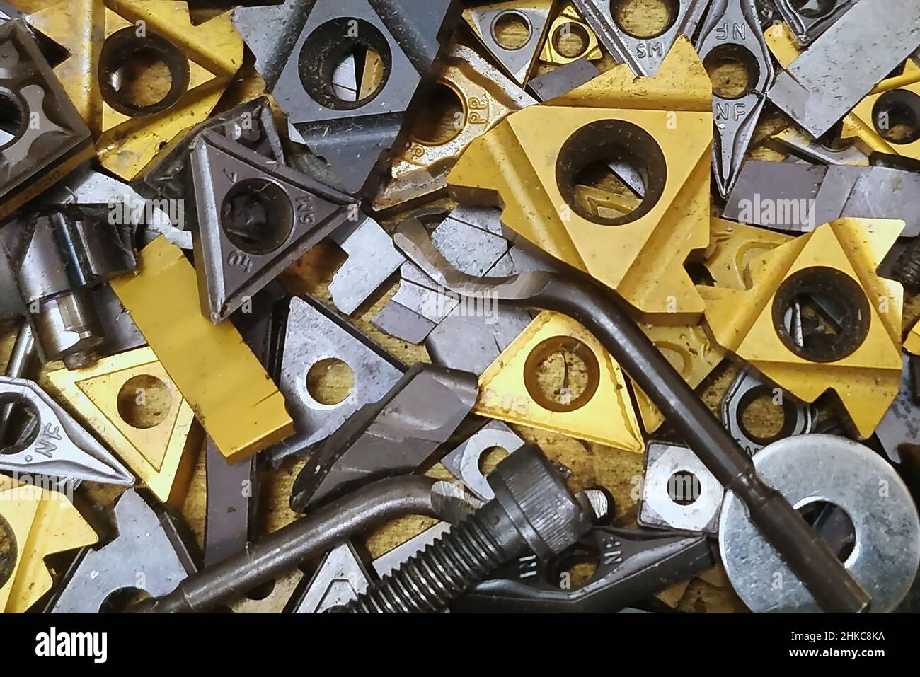 machining metal and plastic blanks on a multi-profile CNC machine Stock ...