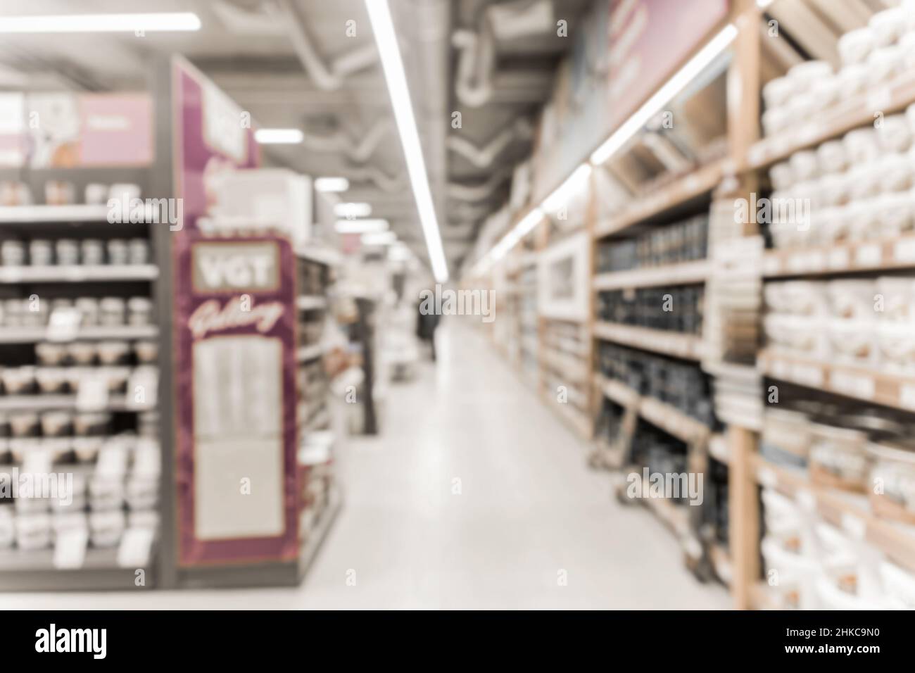 Blurry background of a hardware store with shelves and materials for ...