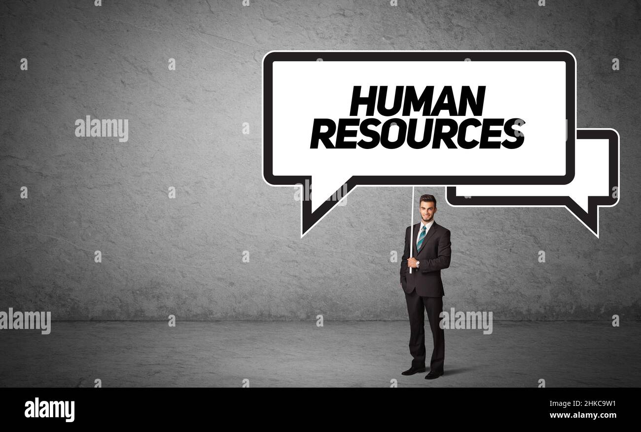 business person in casual holding road sign Stock Photo - Alamy