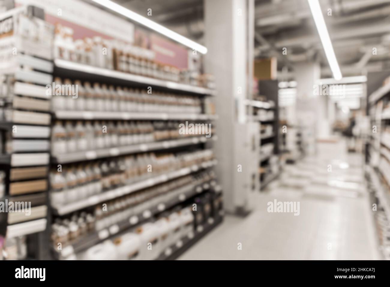 Blurry background of a hardware store with shelves and materials for ...