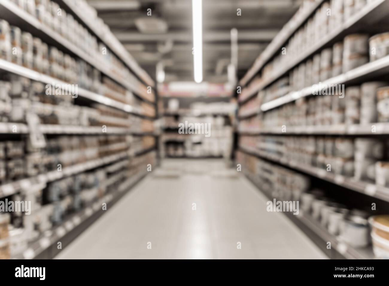 Blurry background of a hardware store with shelves and materials for ...
