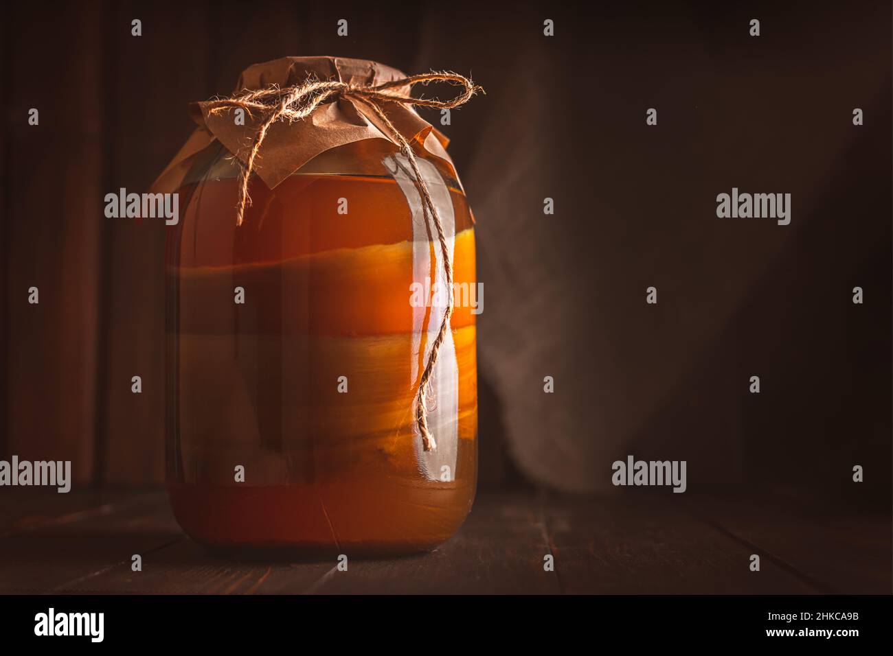 kombucha with layers in a large three-liter jar. organic healthy drink ...