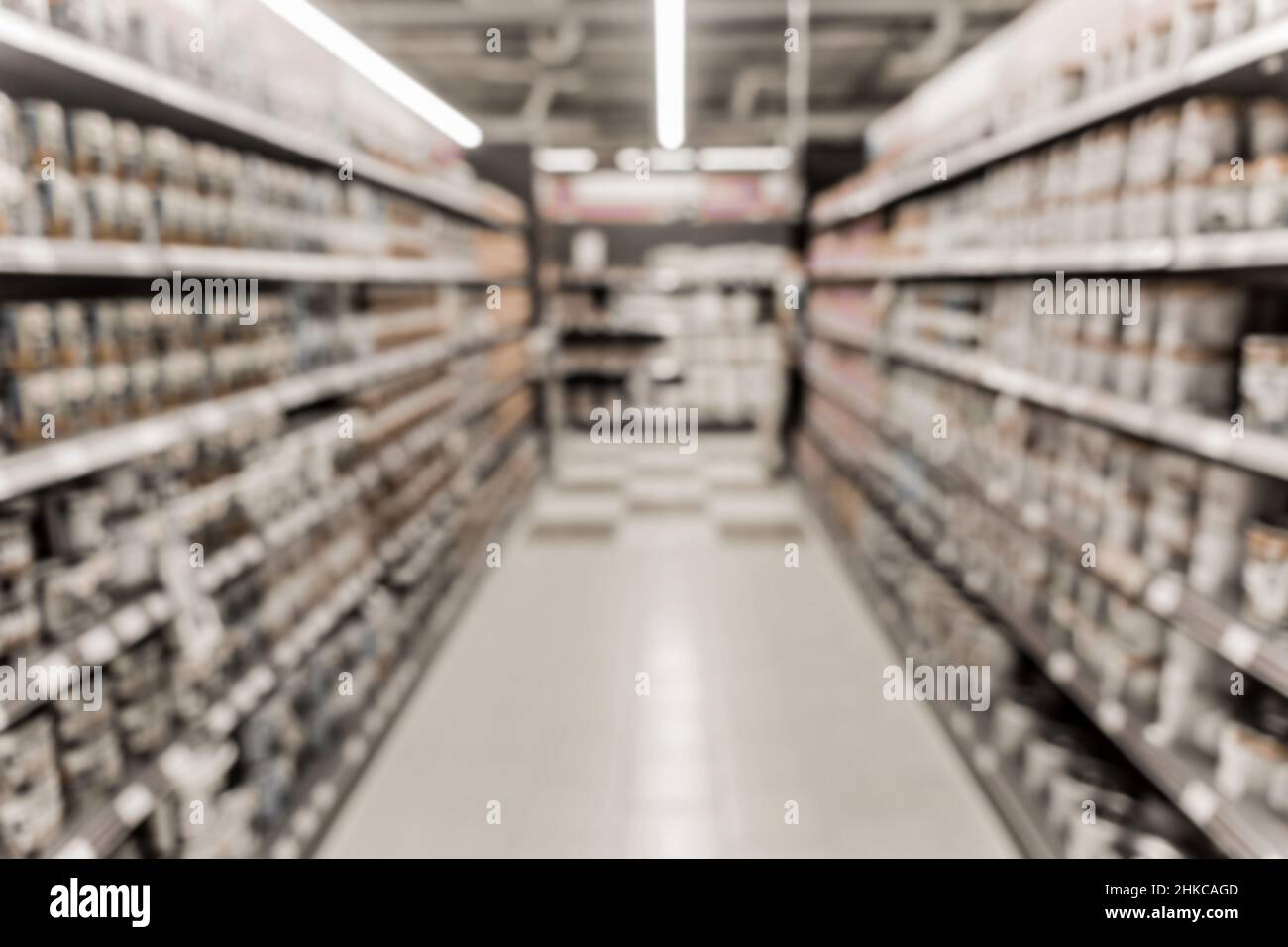 Blurry background of a hardware store with shelves and materials for ...