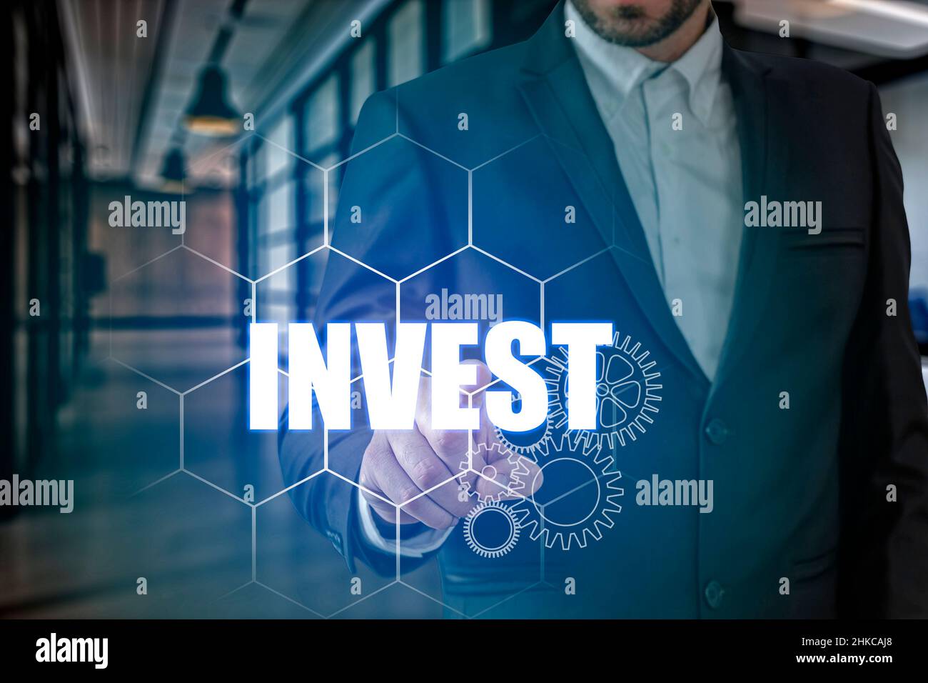 Businessman hand touching INVEST point, network connection Stock Photo ...