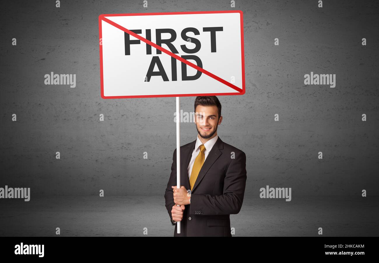 business person holding a traffic sign Stock Photo - Alamy