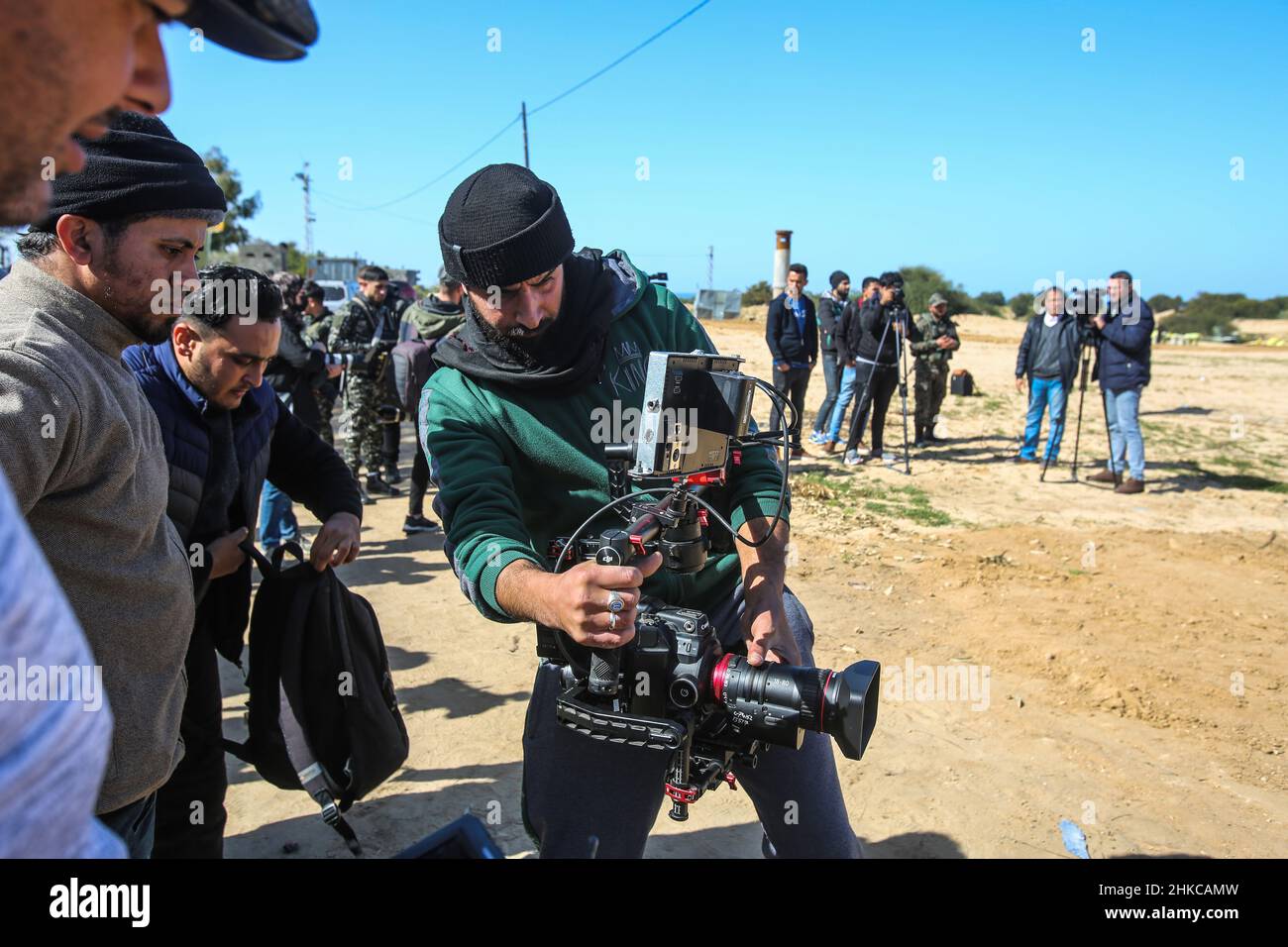 A Palestinian cameraman test the camera before the shooting.A crew from ...