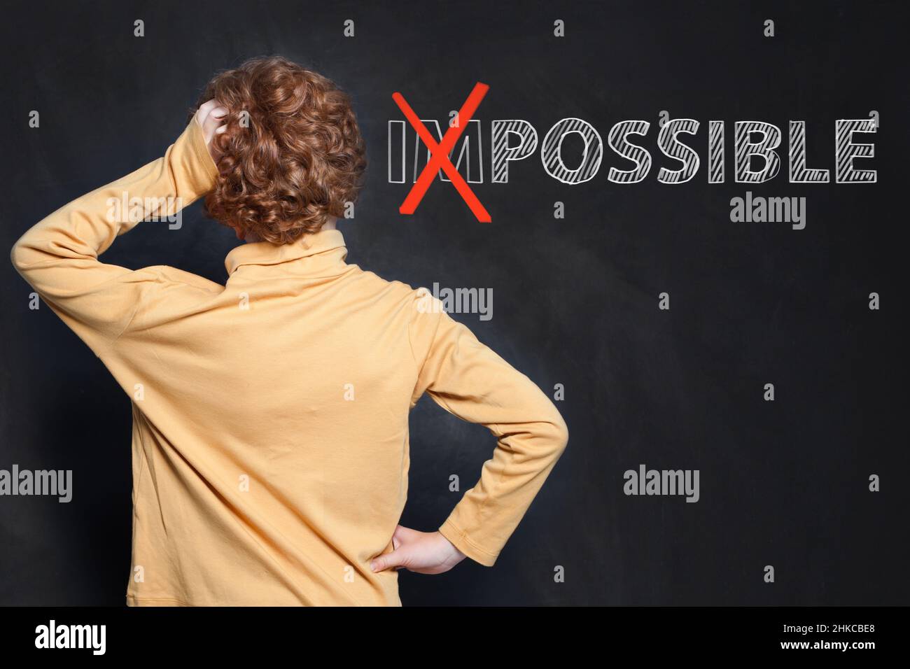 Thinking kid on chalkboard background with text possible Stock Photo ...