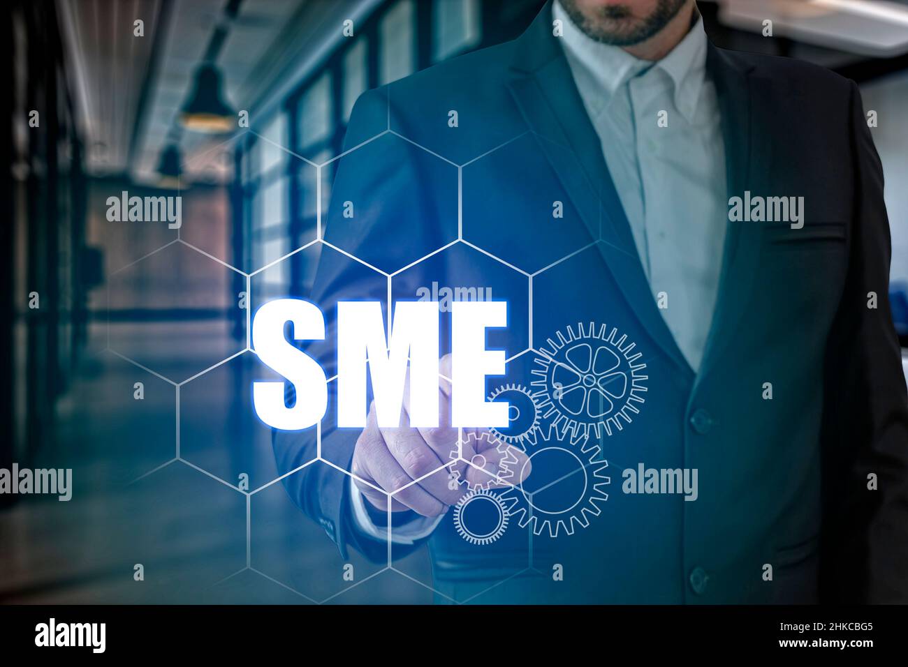 Businessman hand touching SME point, network connection Stock Photo - Alamy