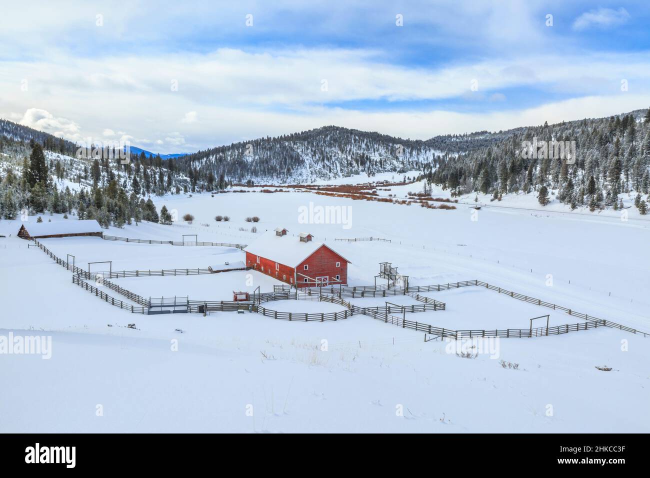 classic old red barn in winter in the dog creek valley near elliston ...