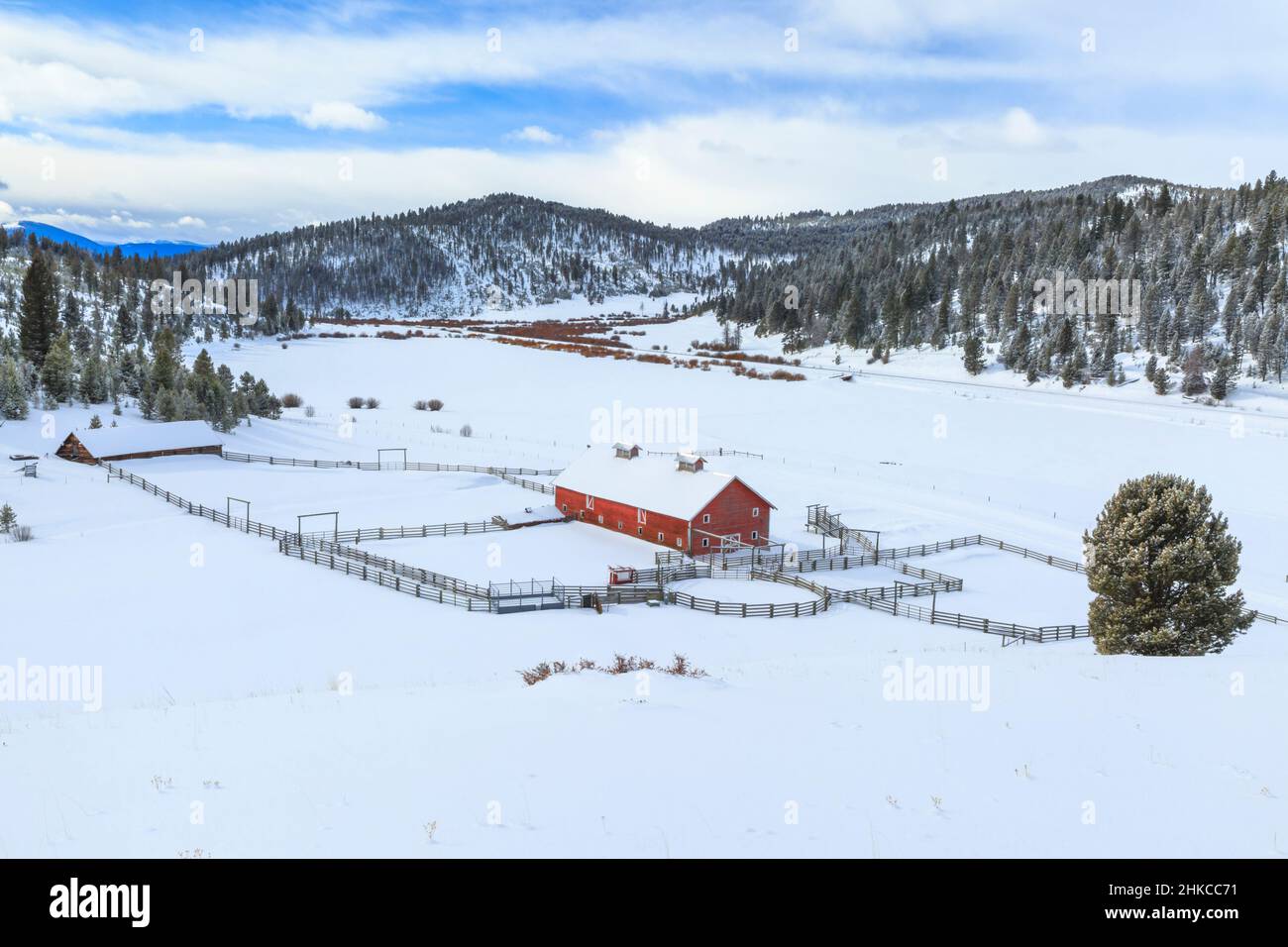 classic old red barn in winter in the dog creek valley near elliston ...
