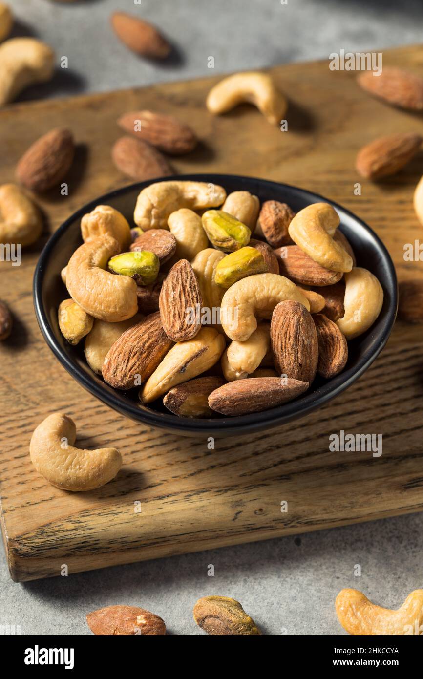 Roasted Salty Assorted Nut Mix with Cashews and Almonds Stock Photo - Alamy