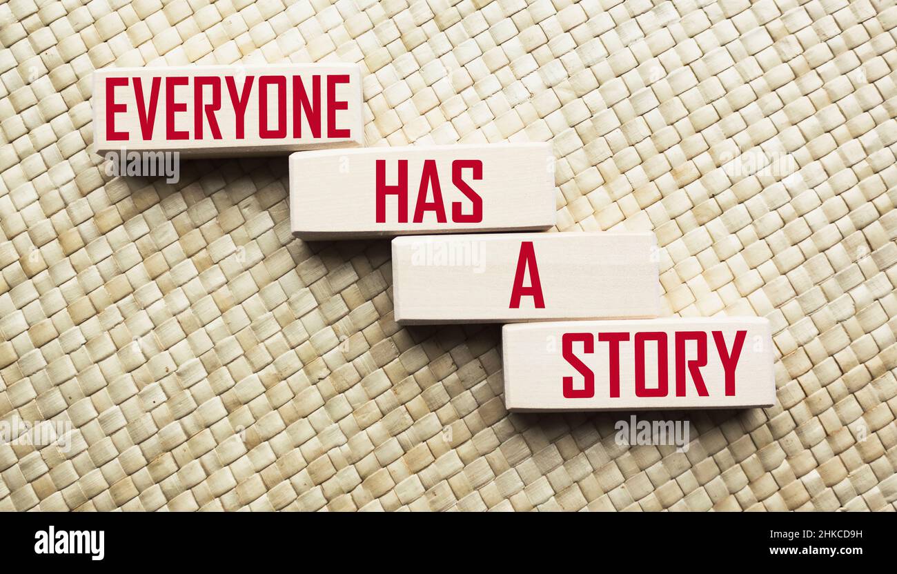 Everyone Has a Story written on a wooden block. Everyone has history ...