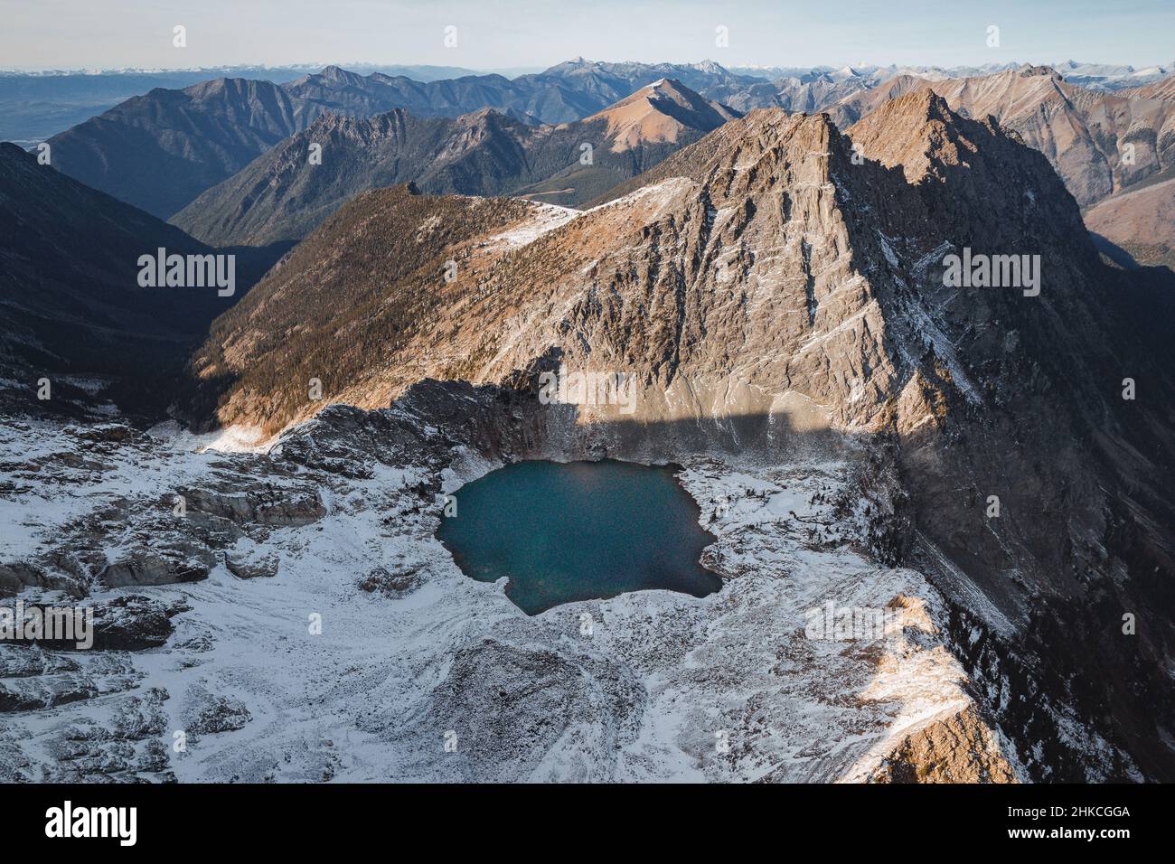 Aerial Mountain Range and Blue Alpine Lake in Cranbrook, British ...