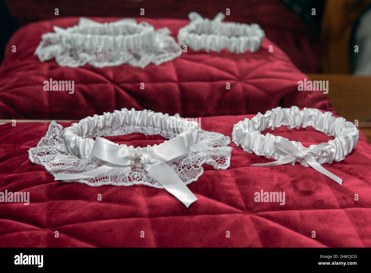 His and hers wedding garters for the bride and groom to wear during the ...