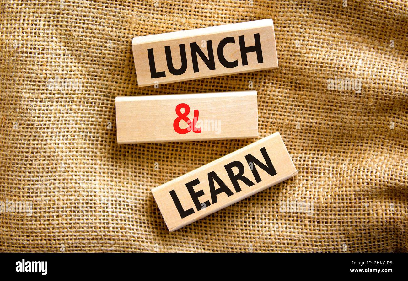 Lunch and learn symbol. Concept words Lunch and learn on wooden blocks ...