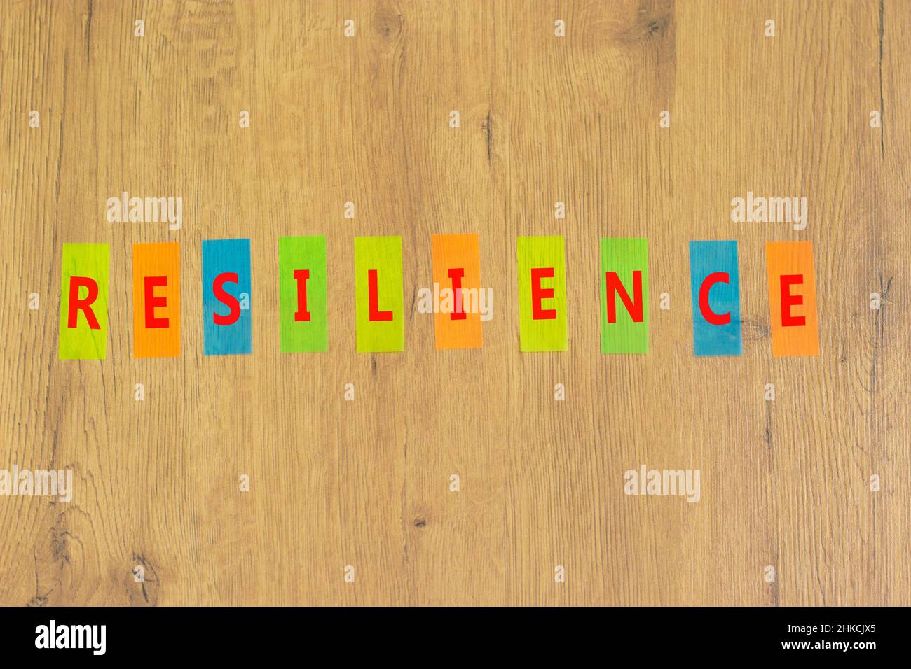 Resilience success symbol. The concept word Resilience on colored ...