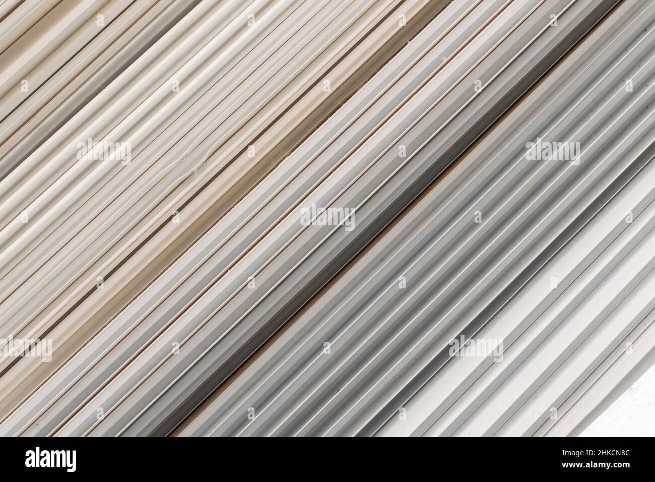 Old PVC plastic panels in a pile of building used recycling ...