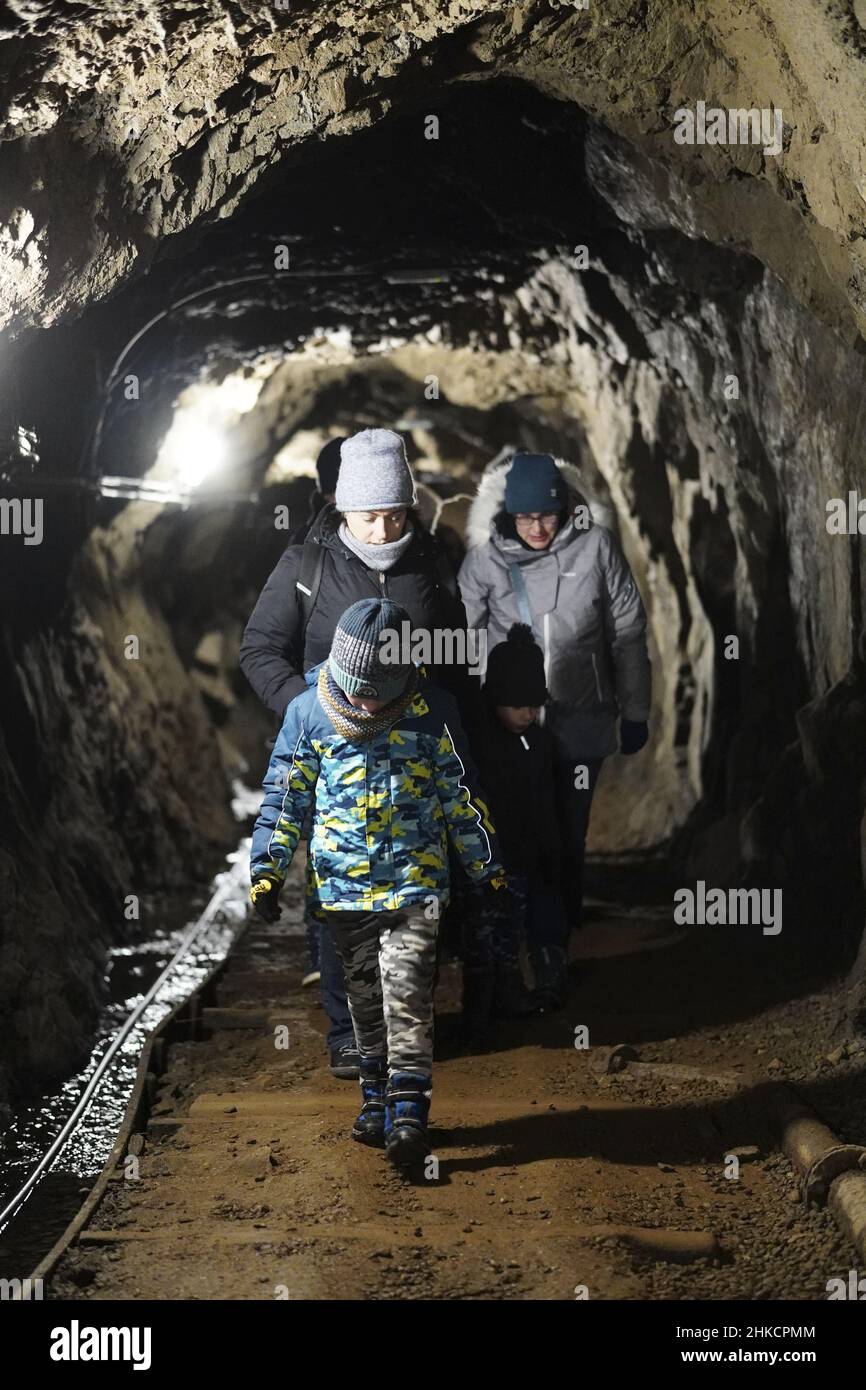 People walking in a mine Stock Photo - Alamy