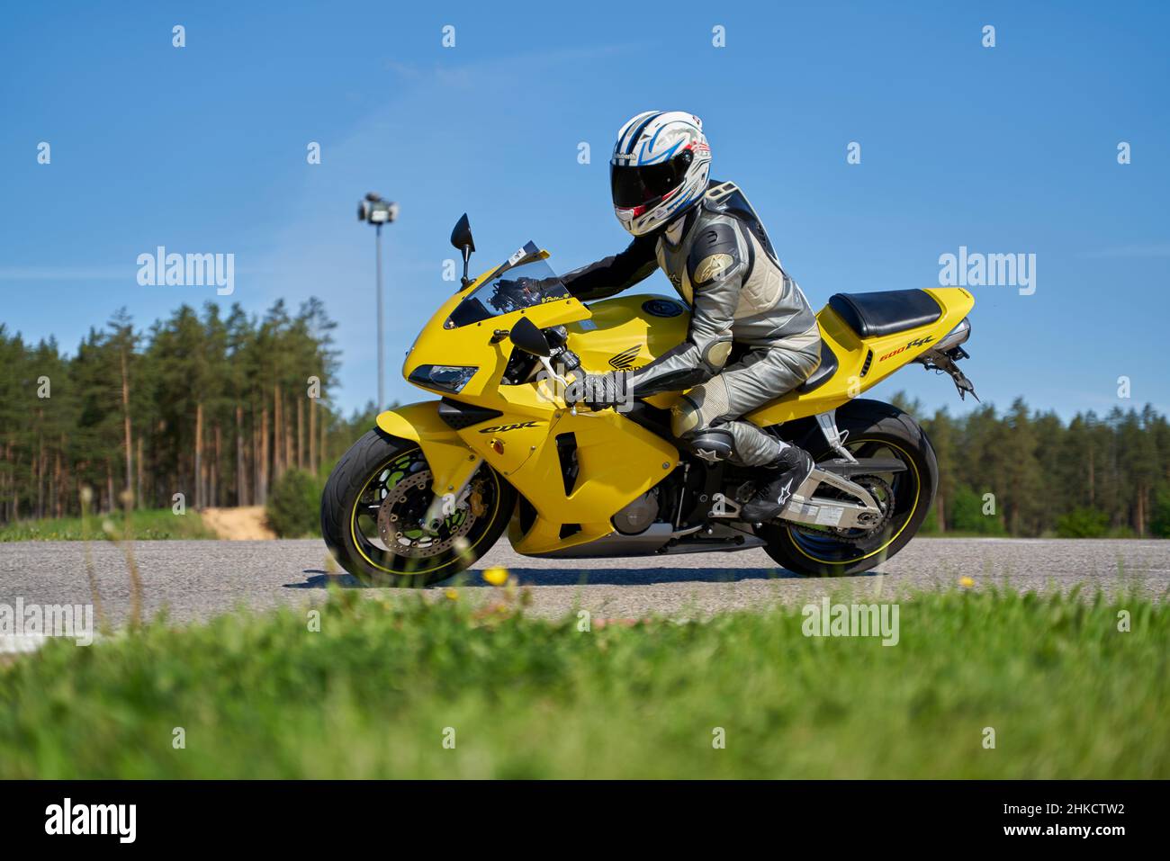 11-05-2020 Riga, Latvia Motorcyclist at sport bike rides by empty ...