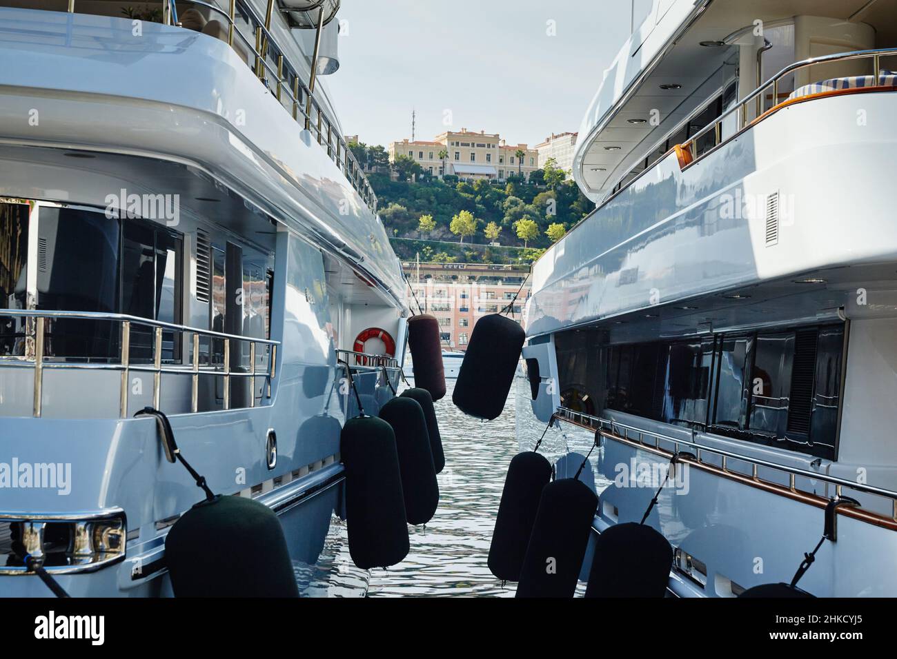 Monaco, Monte-Carlo, two large motor yachts are parked side by side in ...