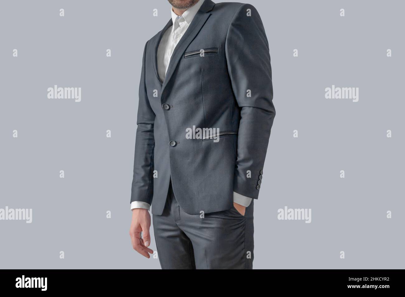 Man in elegant custom tailored expensive suit posing Stock Photo - Alamy