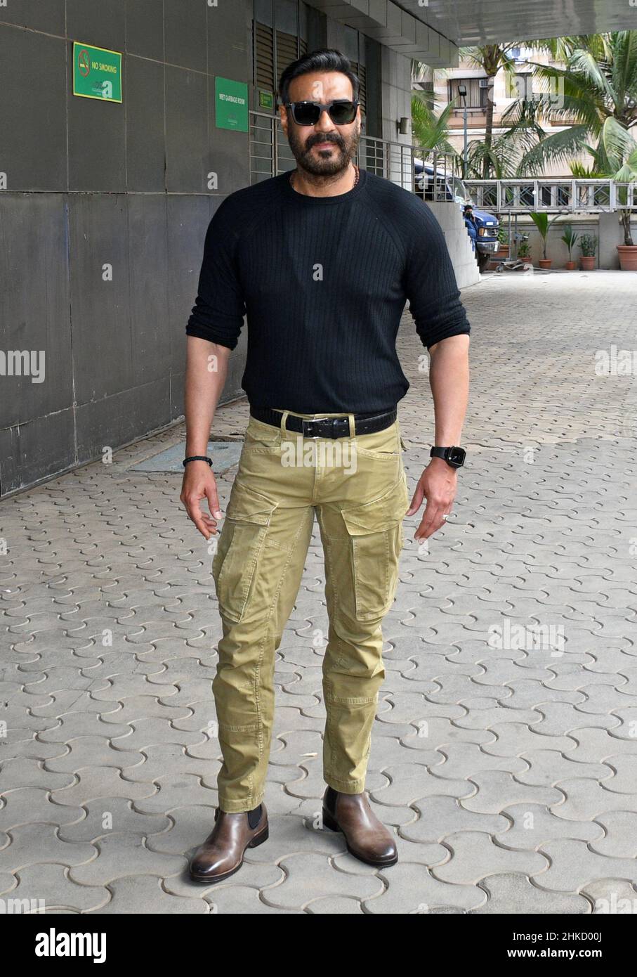 Bollywood actor Ajay Devgn poses for a photo during a promotional event ...