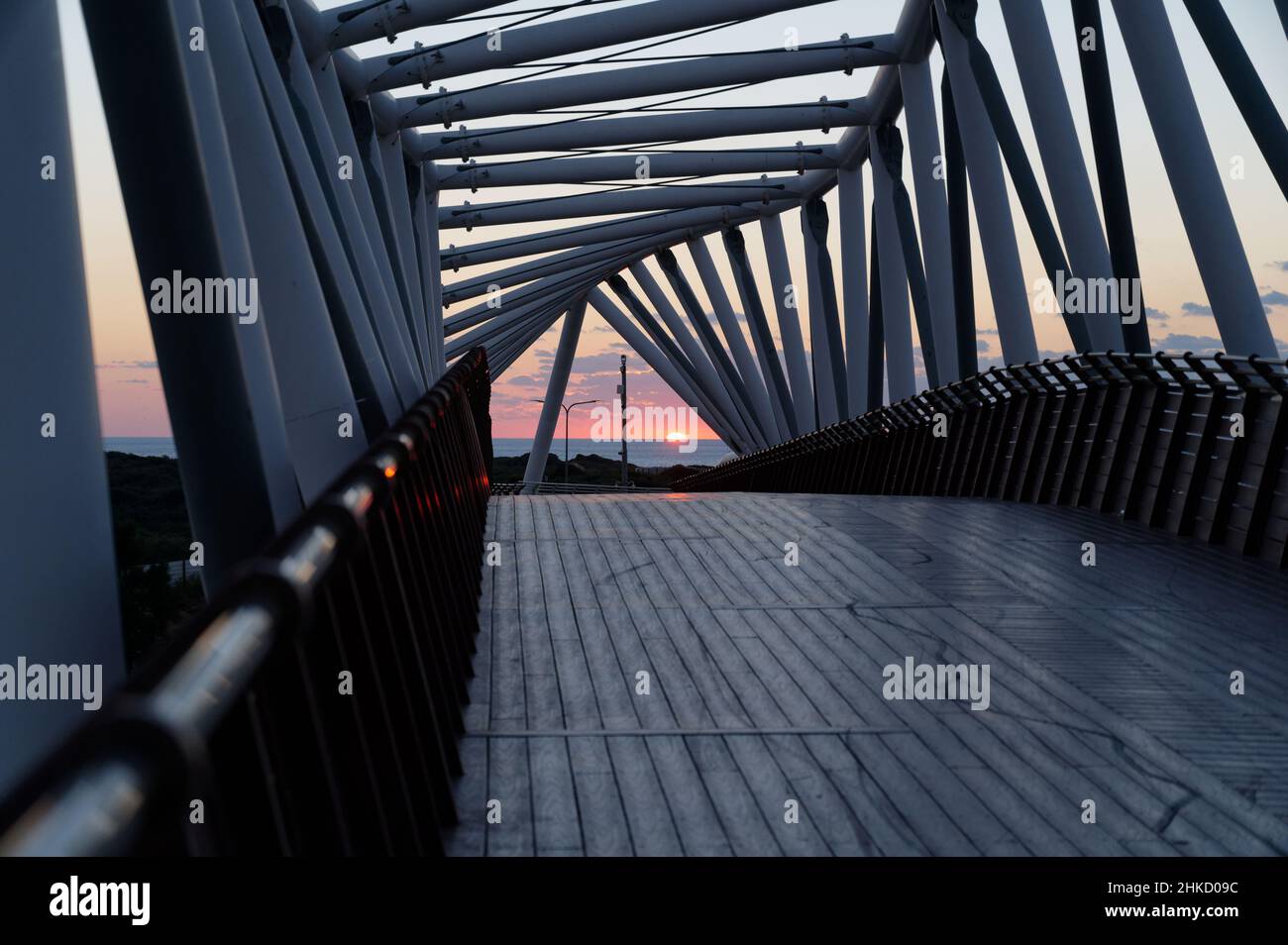 Curved bridge of original architecture. The bridge is located in south ...
