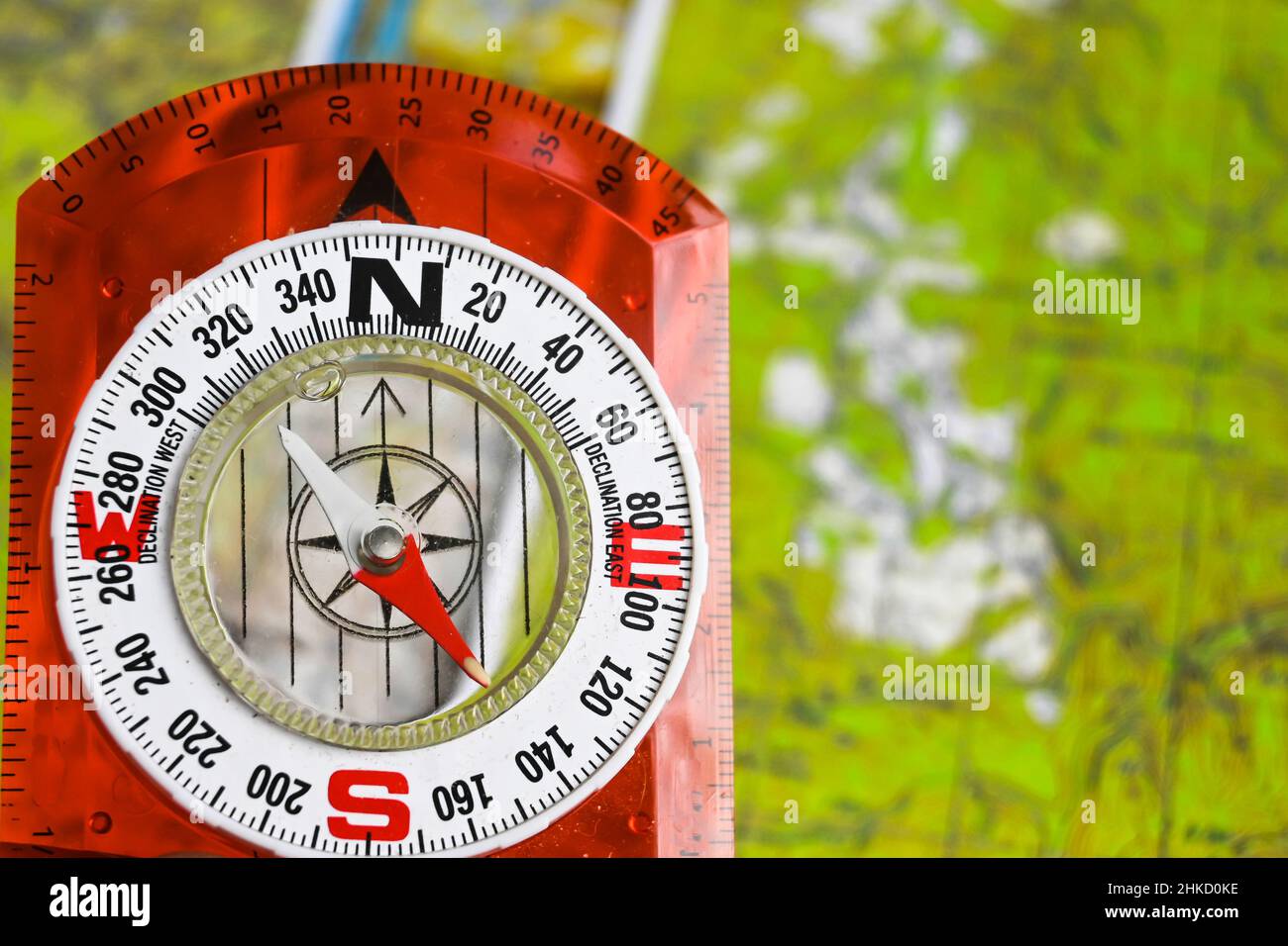 Magnetic compass. Compass on the background of the map Stock Photo - Alamy