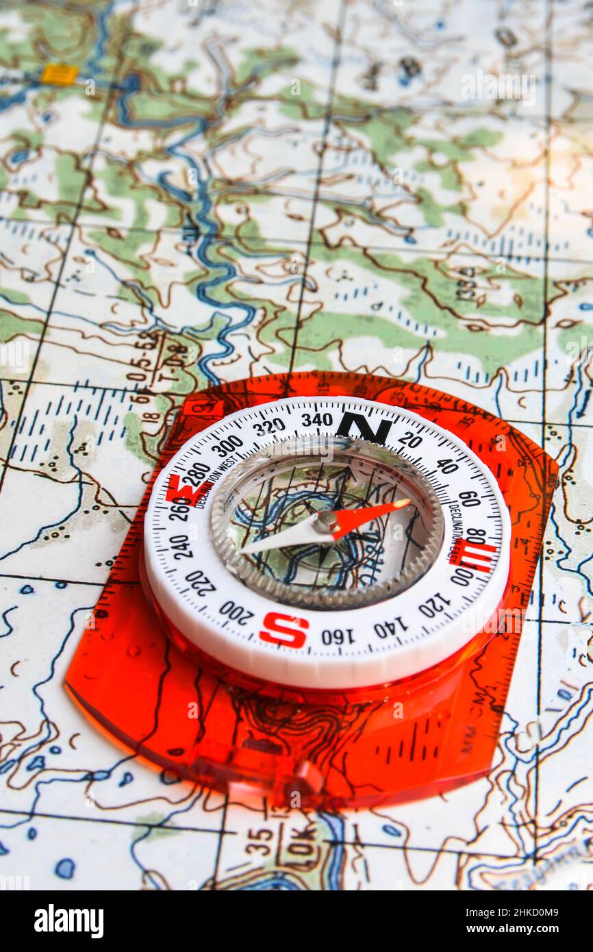 Magnetic compass. Compass on the background of the map Stock Photo - Alamy