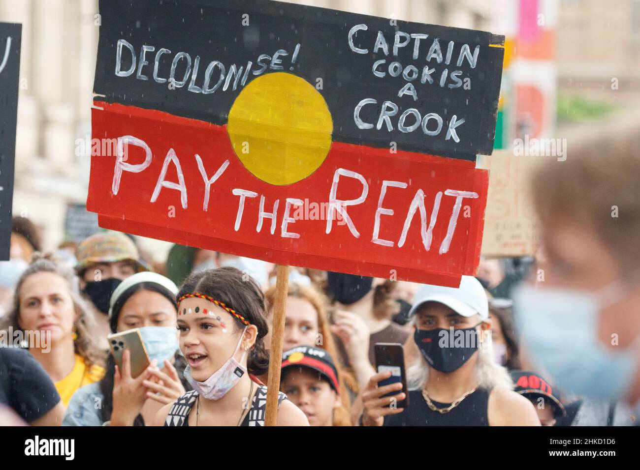 A protester holds a placard during the demonstration.Protesters took to ...