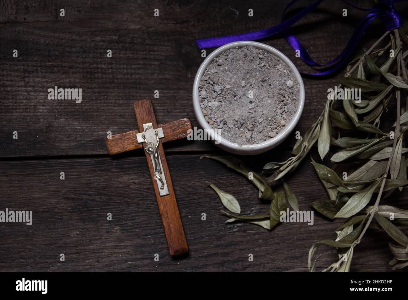 bowl with ashes and olive branch. ash wednesday concept Stock Photo - Alamy