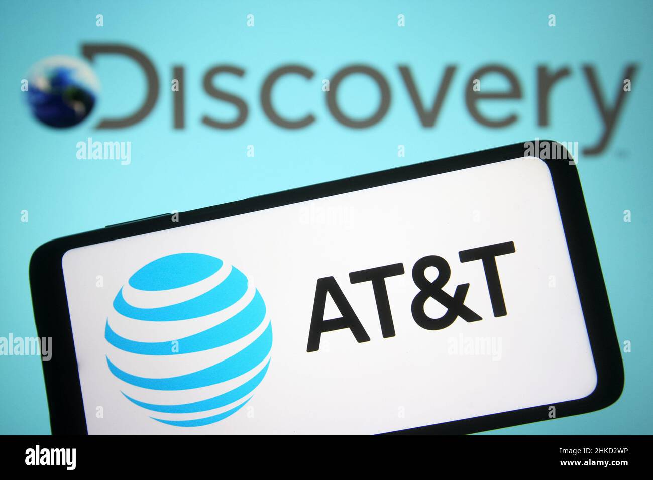 In this photo illustration, an AT&T Inc. logo is seen on a smartphone ...