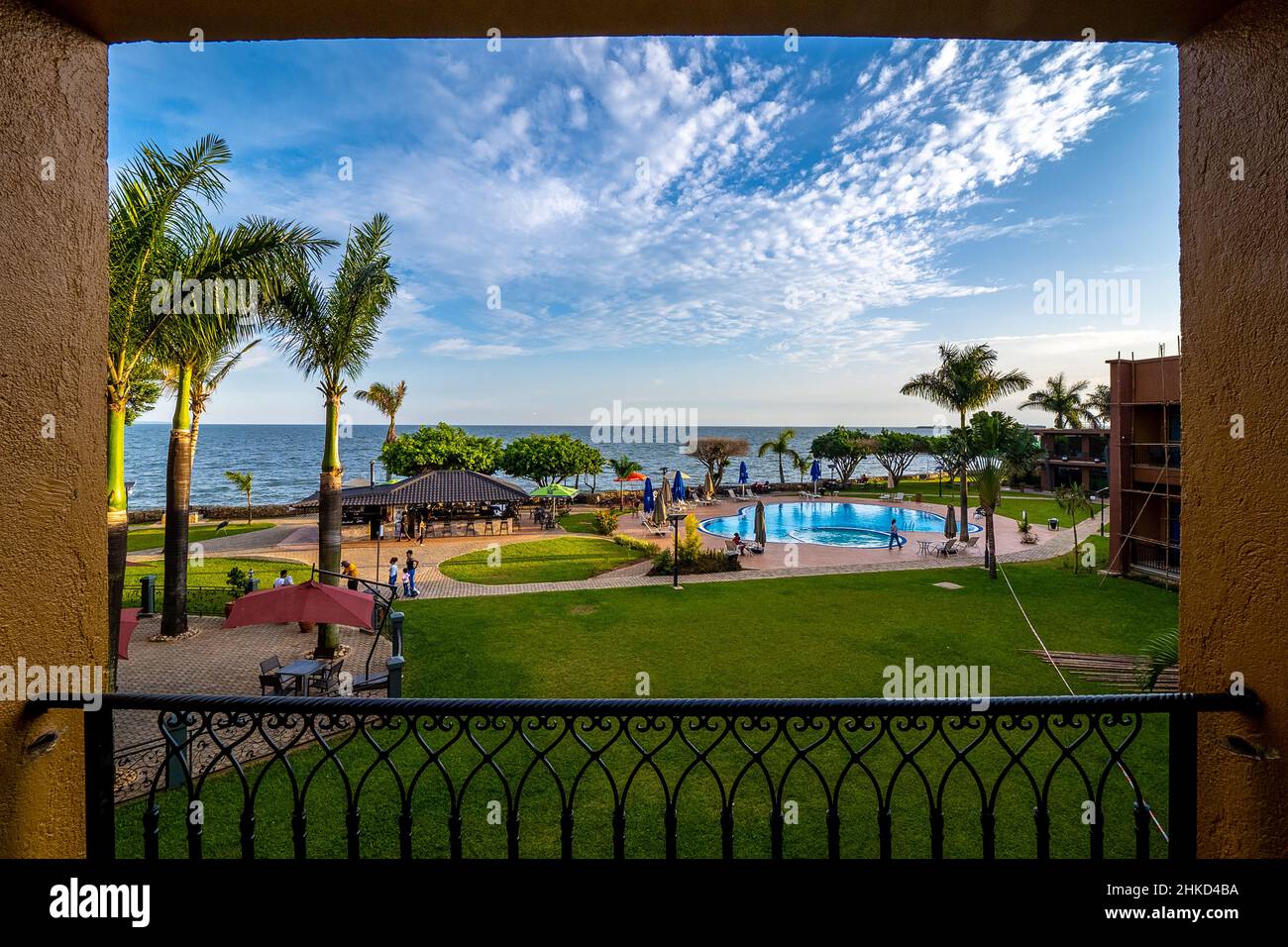 High angle view of the poolside of an upscale hotel resort comlex along ...