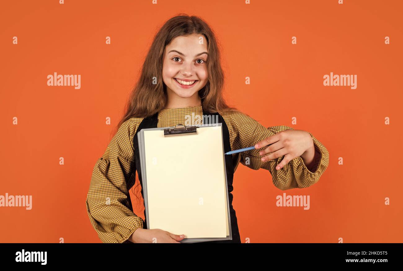 happy teen girl with document folder. happy childhood. pretty child on ...