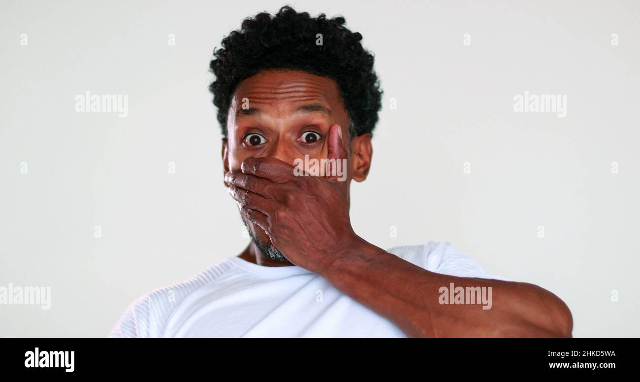 African american gradual shock reaction, face emotion black guy reacting with horror putting ...
