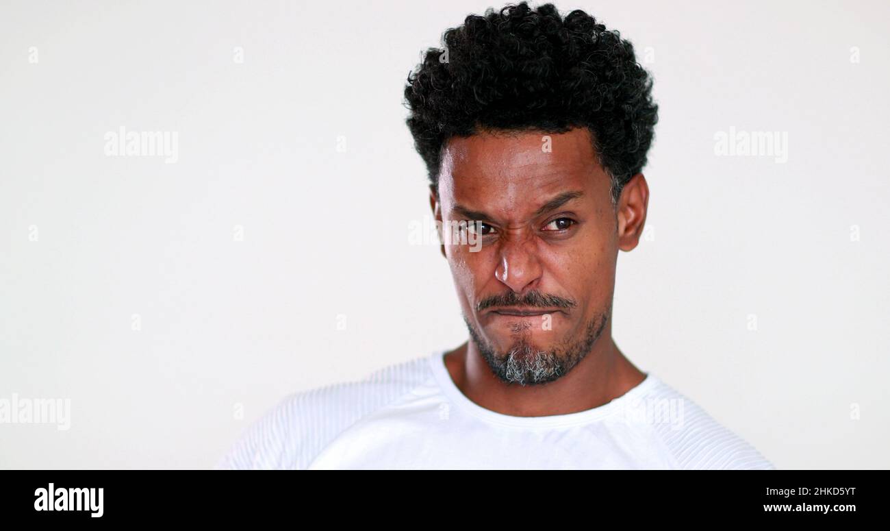 African man disgust face reaction. Black guy feeling dislike Stock ...