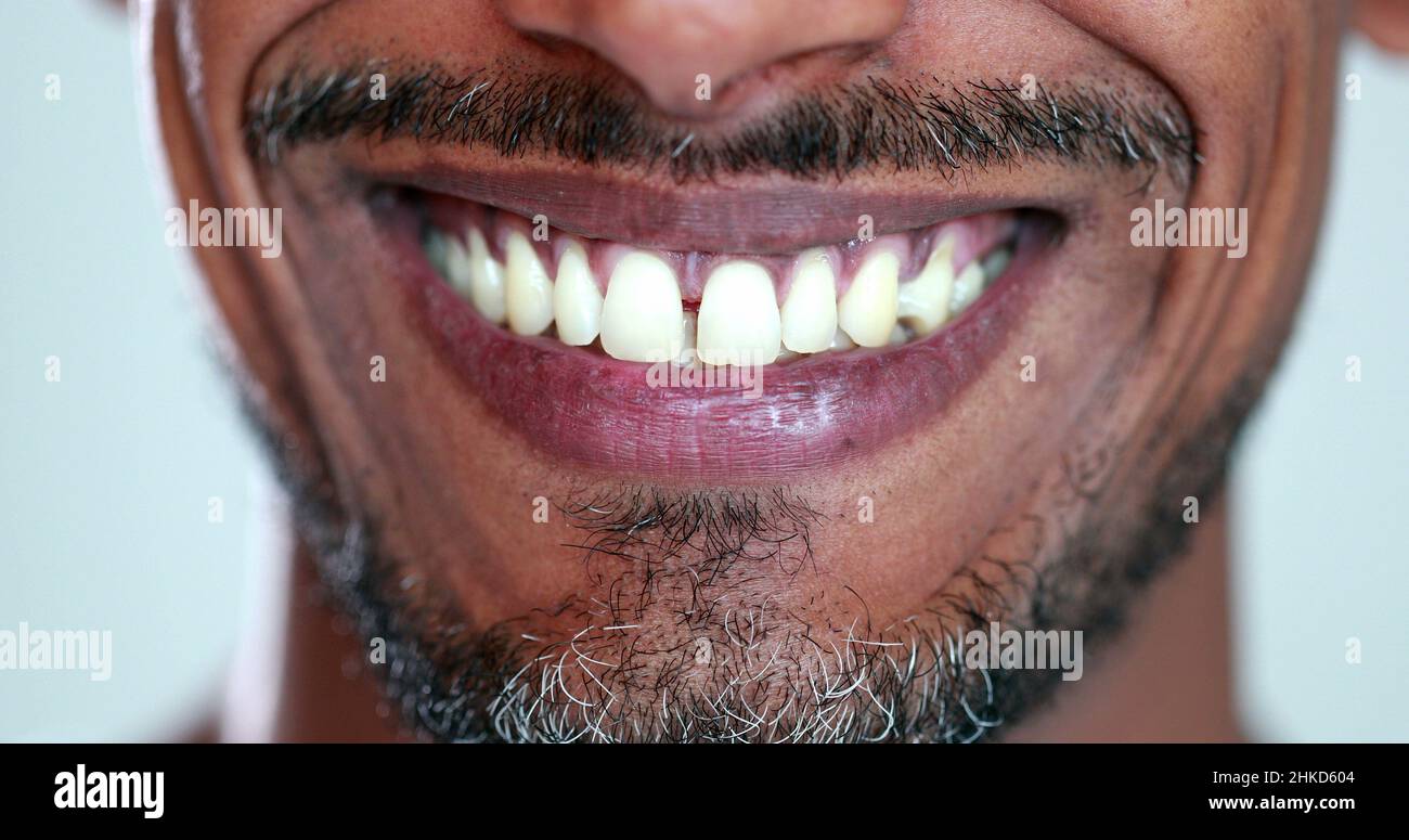 African man descent wide smile to camera close-up mouth Stock Photo - Alamy